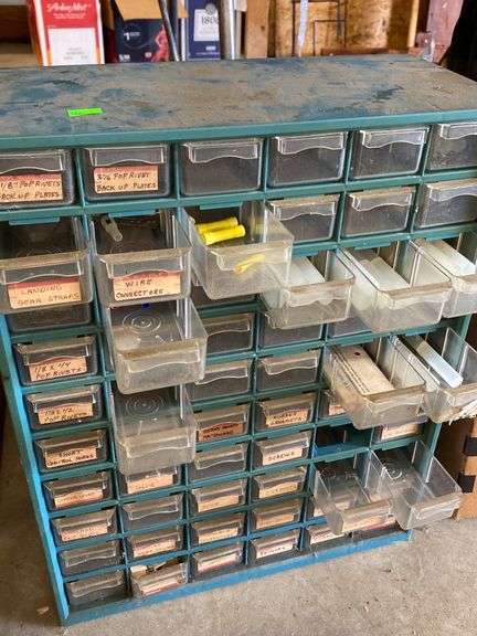 Storage container with miscellaneous items - Metzger Property Services LLC