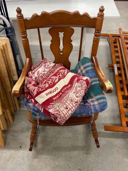 Wooden rocking chair with pillows and blankets - Metzger Property ...