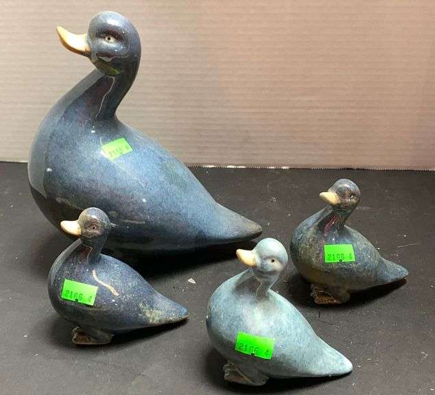 (4) ceramic blue ducks - Metzger Property Services LLC