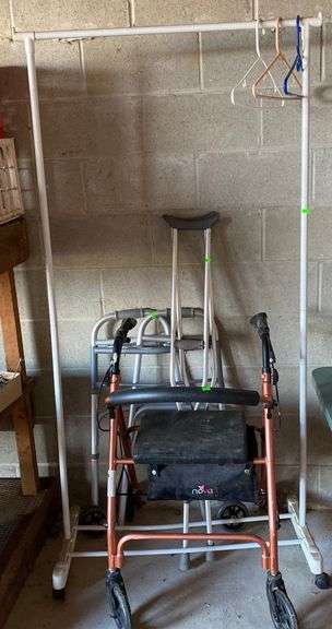 Walkers, crutches, hanging rack - Metzger Property Services LLC