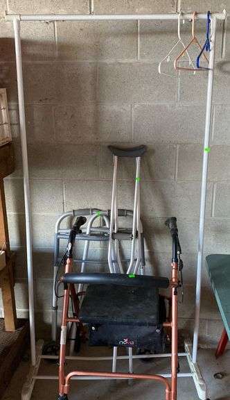 Walkers, crutches, hanging rack - Metzger Property Services LLC
