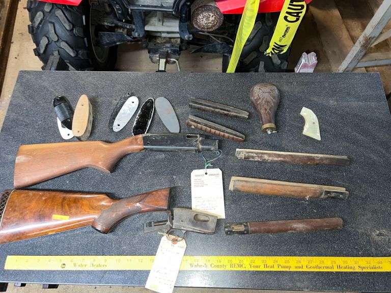 Assorted gun stocks, Gun parts. - Metzger Property Services LLC