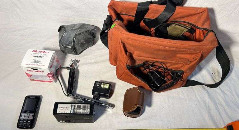 Gold crest camera flash; Vivitar 50 camera flash; Samsung cell phone ...