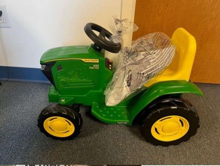 Peg Perogo: john Deere Mini Tractor ($124.99 Value) - Metzger Property ...