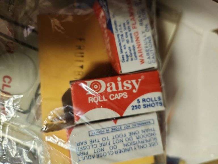 Daisy roll caps, chevy decals, scissors - Metzger Property Services LLC