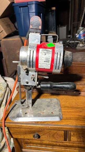 Consew model 510 electric cloth cutter - Metzger Property Services LLC