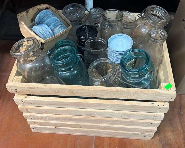Canning jar assortment , assorted glass jars and bottles , wood crate ...