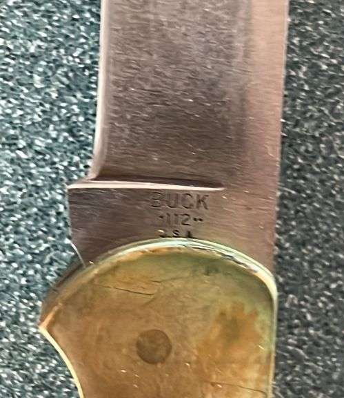 Buck lock blade knife and leather sheath - Metzger Property Services LLC