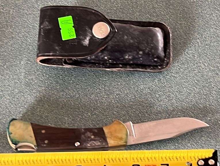 Buck lock blade knife and leather sheath - Metzger Property Services LLC