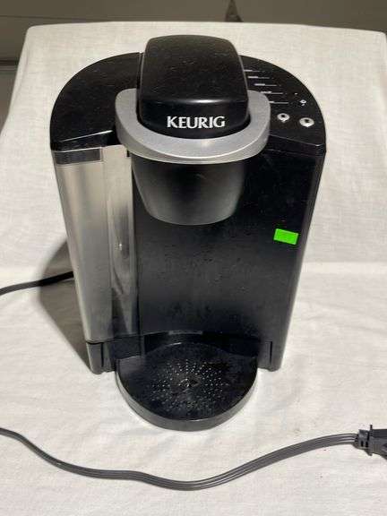 Keurig coffee machine - Metzger Property Services, LLC