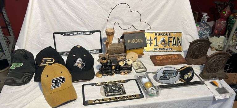 Purdue memorabilia inc. ball caps, license plate covers, cast iron book ...