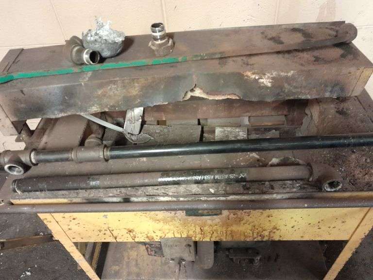 1 Yellow Johnson Gas, metal forge - Metzger Property Services, LLC