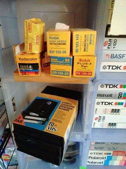 Kodak film, Cassette and VHS tapes empty, plastic storage containers as ...
