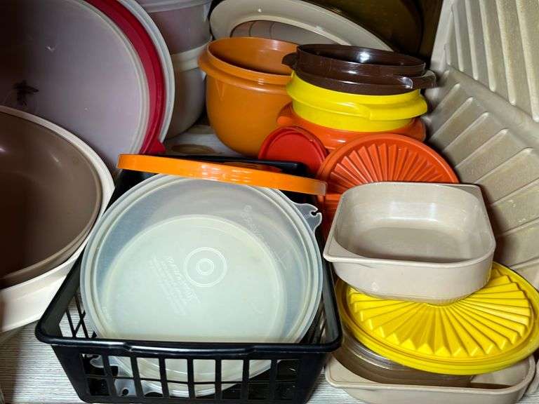 Plasticware including Tupperware, contents of cabinet as shown in ...