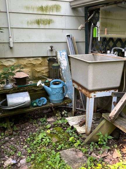 Shop sink 24x21x34" and sprinkler cans and misc as shown in pictures ...