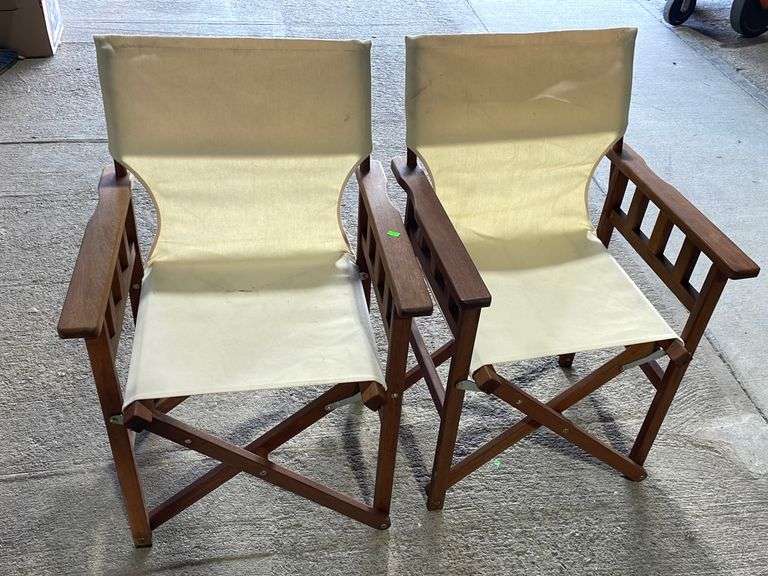 2 Wood and canvas lawn chairs - Metzger Property Services, LLC