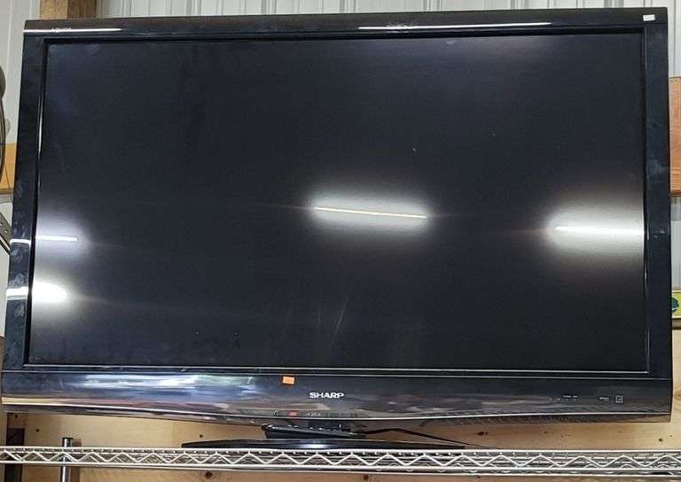 Sharp Aquos 55" Swivel Base TV with Remote - Metzger Property Services, LLC