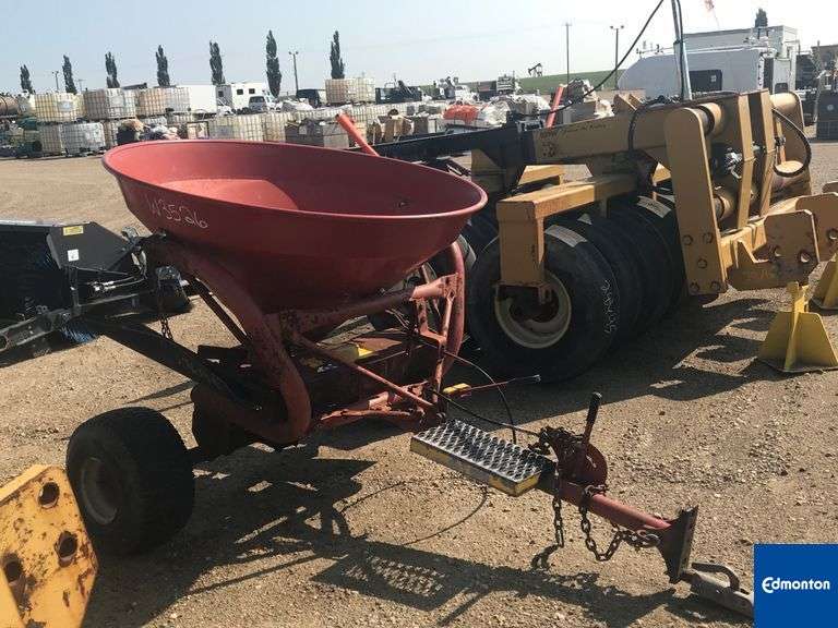 Cosmo PTB560 Pull Behind Spreader - Michener Allen Auctioneering Ltd
