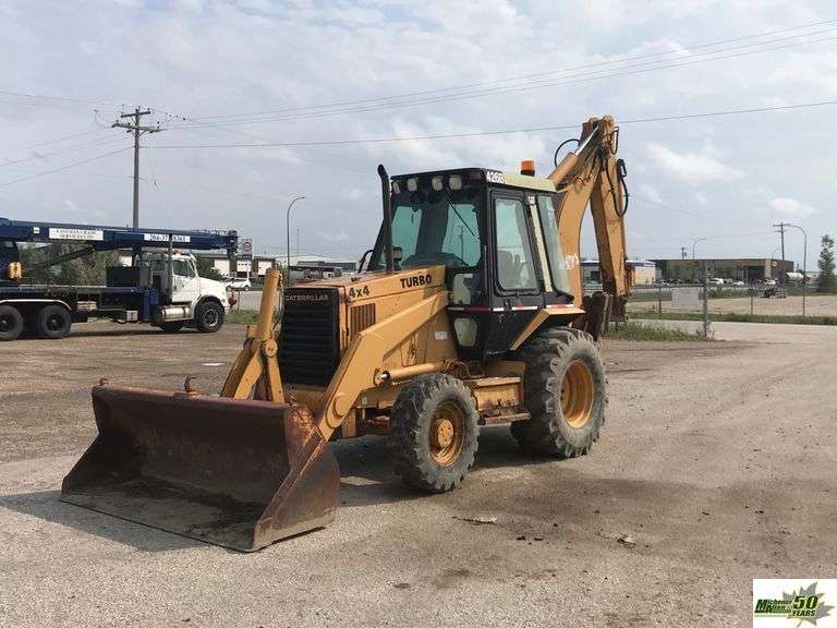 1993 Caterpillar 426B 4x4 Loader Backhoe - Michener Allen Auctioneering Ltd
