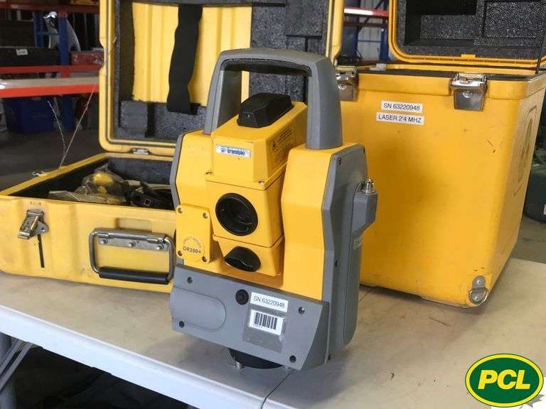 Trimble DR200 and TSC2-Qty 2 Boxes - Michener Allen Auctioneering Ltd