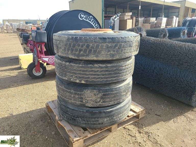 11R24.5 Tires and Rims-Qty 4, 1 Pallet - Michener Allen Auctioneering Ltd