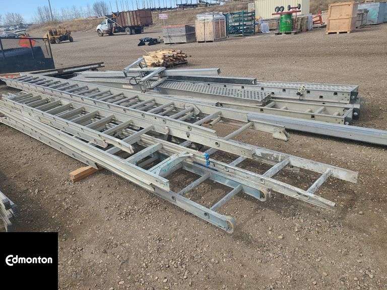 Assorted Lengths of Ladders-1 Pallet - Michener Allen Auctioneering Ltd