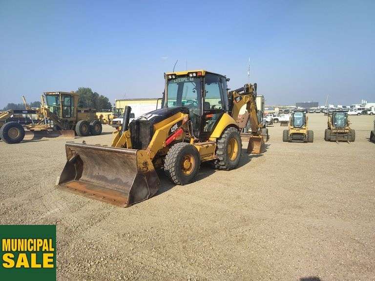 2009 Caterpillar 420E 4x4 Loader Backhoe - Michener Allen Auctioneering Ltd