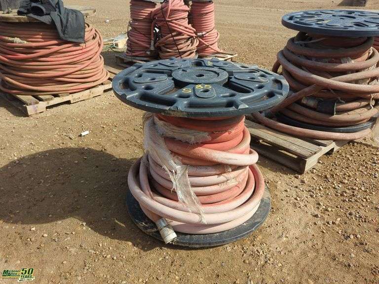 Spool of Water Hose - Michener Allen Auctioneering Ltd