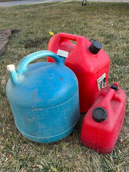 2 gas cans and 1 Kerosene Can - McLaughlin Auctioneers, LLC- mc-bid.com