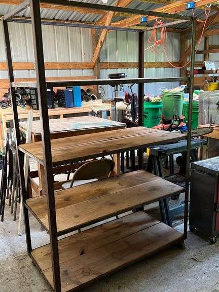 HEAVY DUTY ANGLE IRON SHELF ON CASTERS - McLaughlin Auctioneers, LLC ...