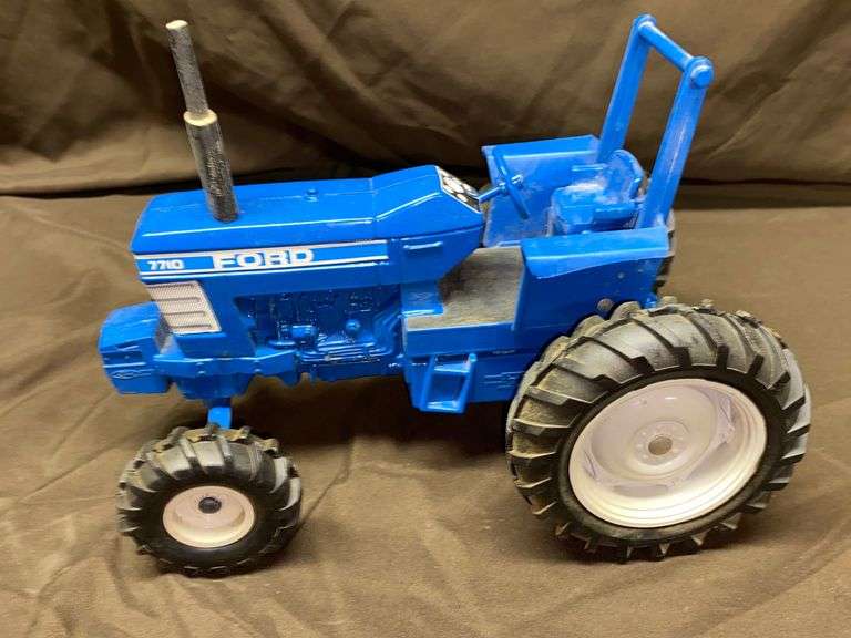 ERTL FORD 7710 TRACTOR - McLaughlin Auctioneers, LLC- mc-bid.com