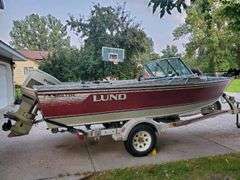1989 Lund Tyee 1850 with Trailer - McLaughlin Auctioneers, LLC- mc-bid.com