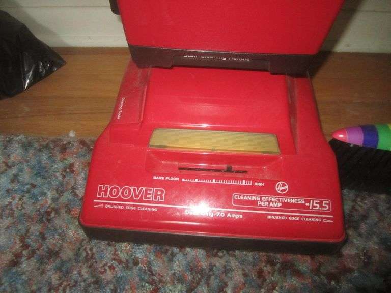 Red hoover vacuum, broom - Mark Van Hook, Auctioneer