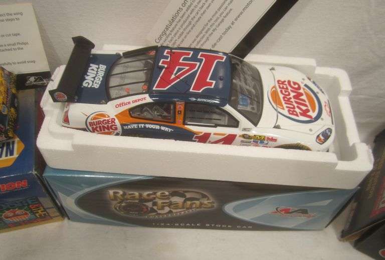 4 diecast NASCAR cars in boxes - Mark Van Hook, Auctioneer