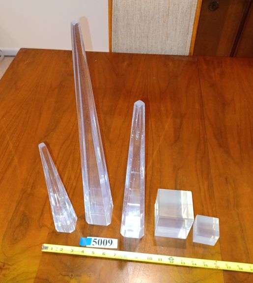 Three lucite obelisks, two lucite cubes - Mark Van Hook, Auctioneer