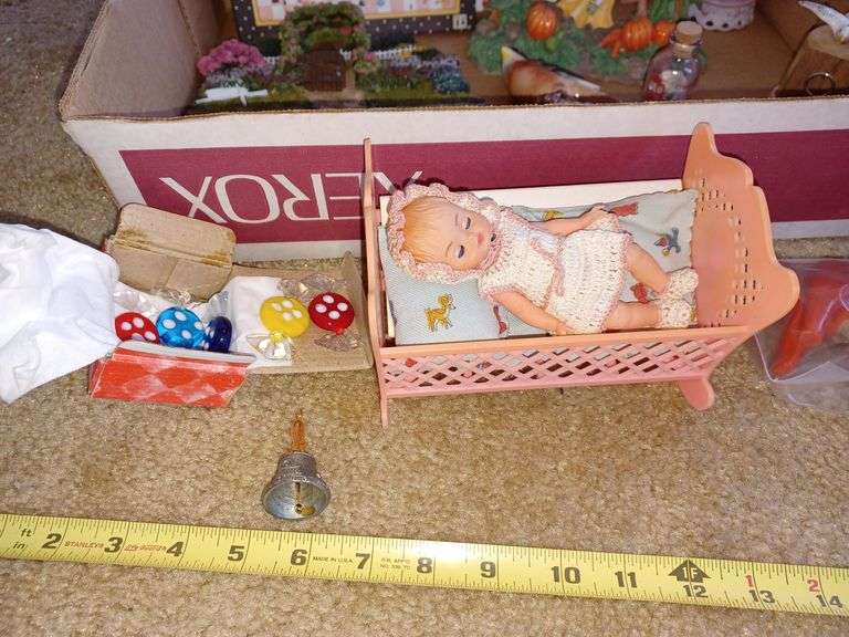 Miniature plastic jointed doll and cradle, glass candy, wall hangings ...