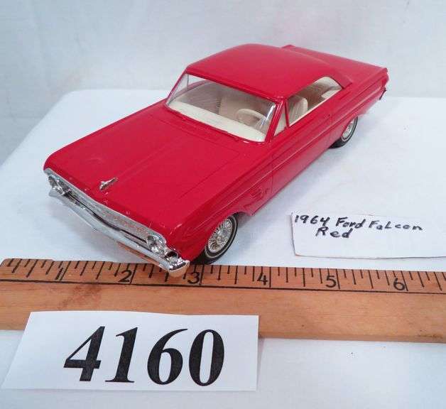 1964 Red Ford Falcon AMT Dealer Promo model car - Mark Van Hook, Auctioneer