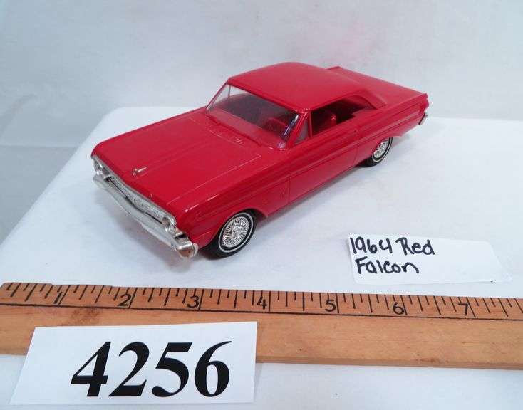 1964 Red Ford Falcon AMT Dealer Promo model car - Mark Van Hook, Auctioneer
