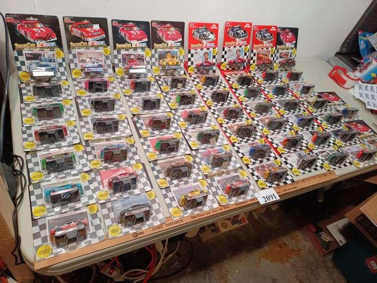 Racing Champions NASCAR race cars in Packaging - Mark Van Hook, Auctioneer