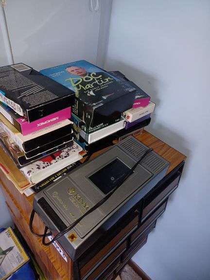 VHS tapes, VHS tape cases and drawers, mid-century end table, cds ...