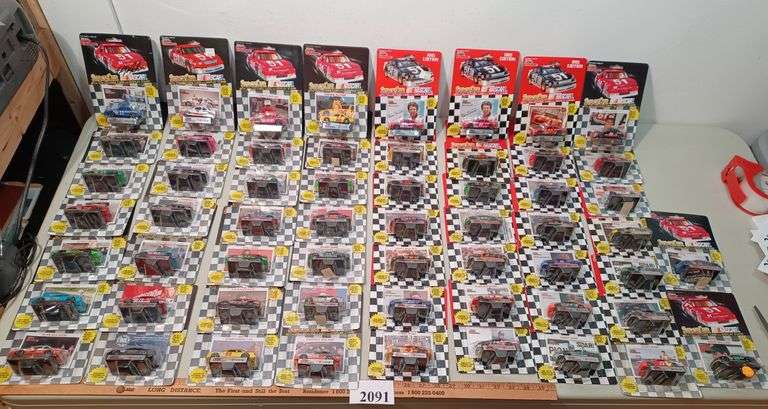 Racing Champions NASCAR race cars in Packaging - Mark Van Hook, Auctioneer