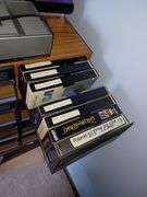 VHS tapes, VHS tape cases and drawers, mid-century end table, cds ...
