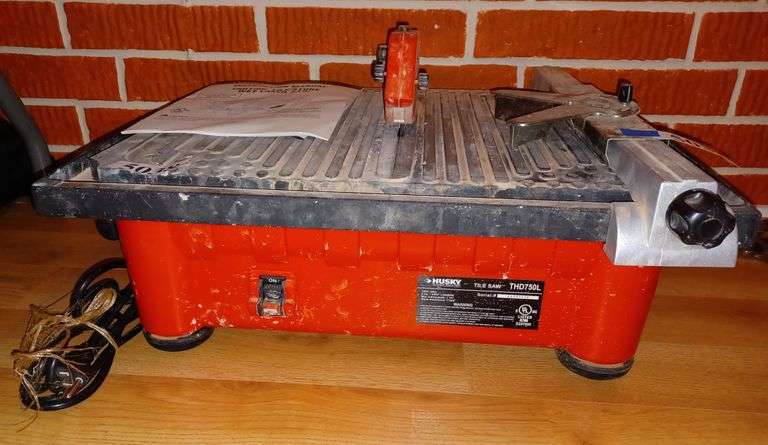 Husky tile saw with instruction manual - Mark Van Hook, Auctioneer