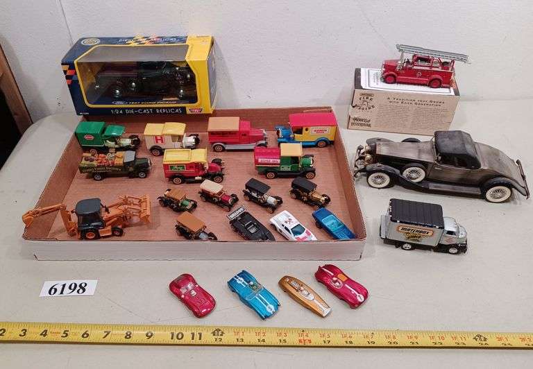 Die-cast truck, Matchbox diecast cars, loader, slot car shells, radio ...