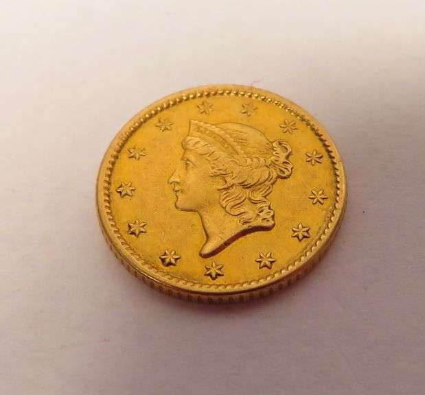 $1 US gold coin, worn date - Mark Van Hook, Auctioneer