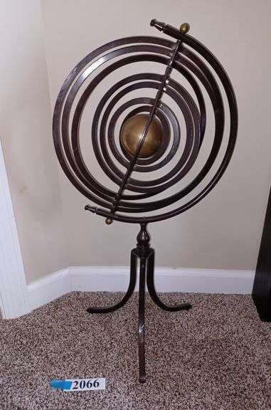 Metal gyroscope type sculpture - Mark Van Hook, Auctioneer