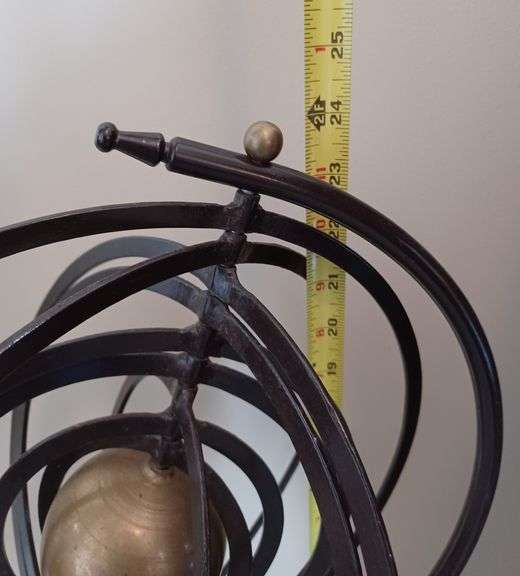 Metal gyroscope type sculpture - Mark Van Hook, Auctioneer