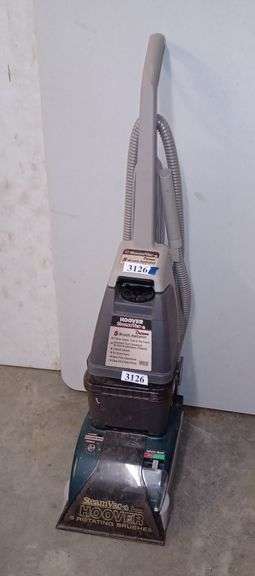 Hoover SteamVac carpet cleaner. Powers on correctly, could use a good ...