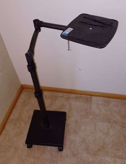 Adjustable height rolling swing-arm laptop stand. - Mark Van Hook ...