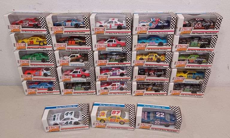 (28) Racing Champions race cars in packaging - Mark Van Hook, Auctioneer